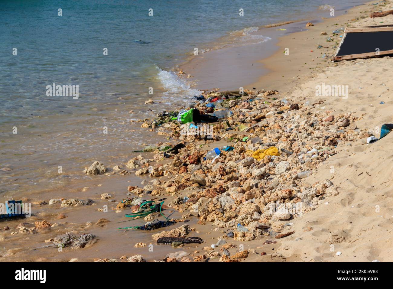 Garbage on a bank of ocean. Pollution of sea, ocean water with waste ...