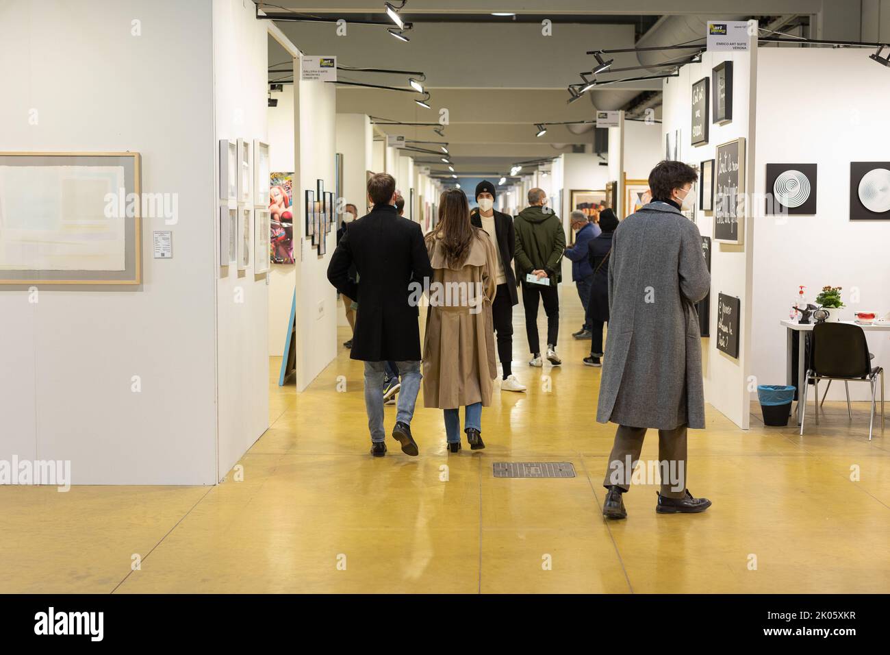 People Walking and Admiring Paintings in a Modern Art Gallery Stock ...