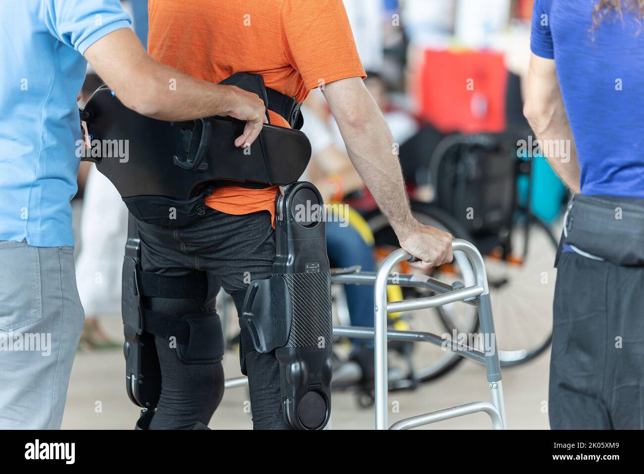 Boy with Mobility Problems in Lower Limbs in Upright Posture Walking ...