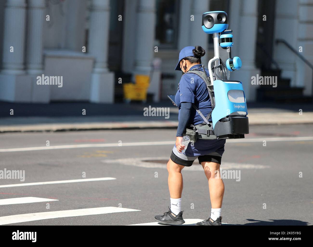 Women walking with 360 google maps cameras on the street in Soho, New York, NY on September 9 ...