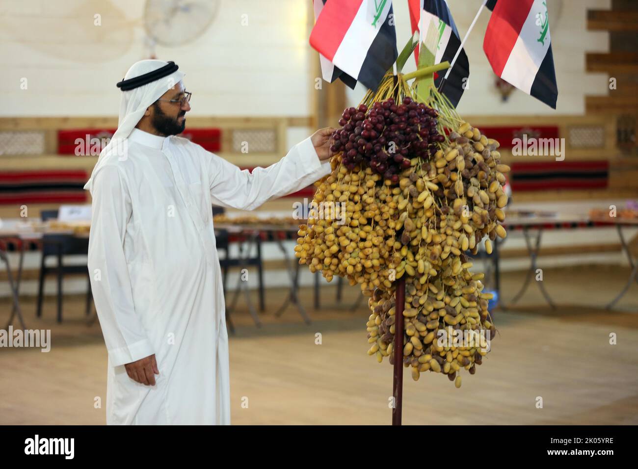 Baghdad, Iraq. 9th Sep, 2022. A visitor looks at different types of ...