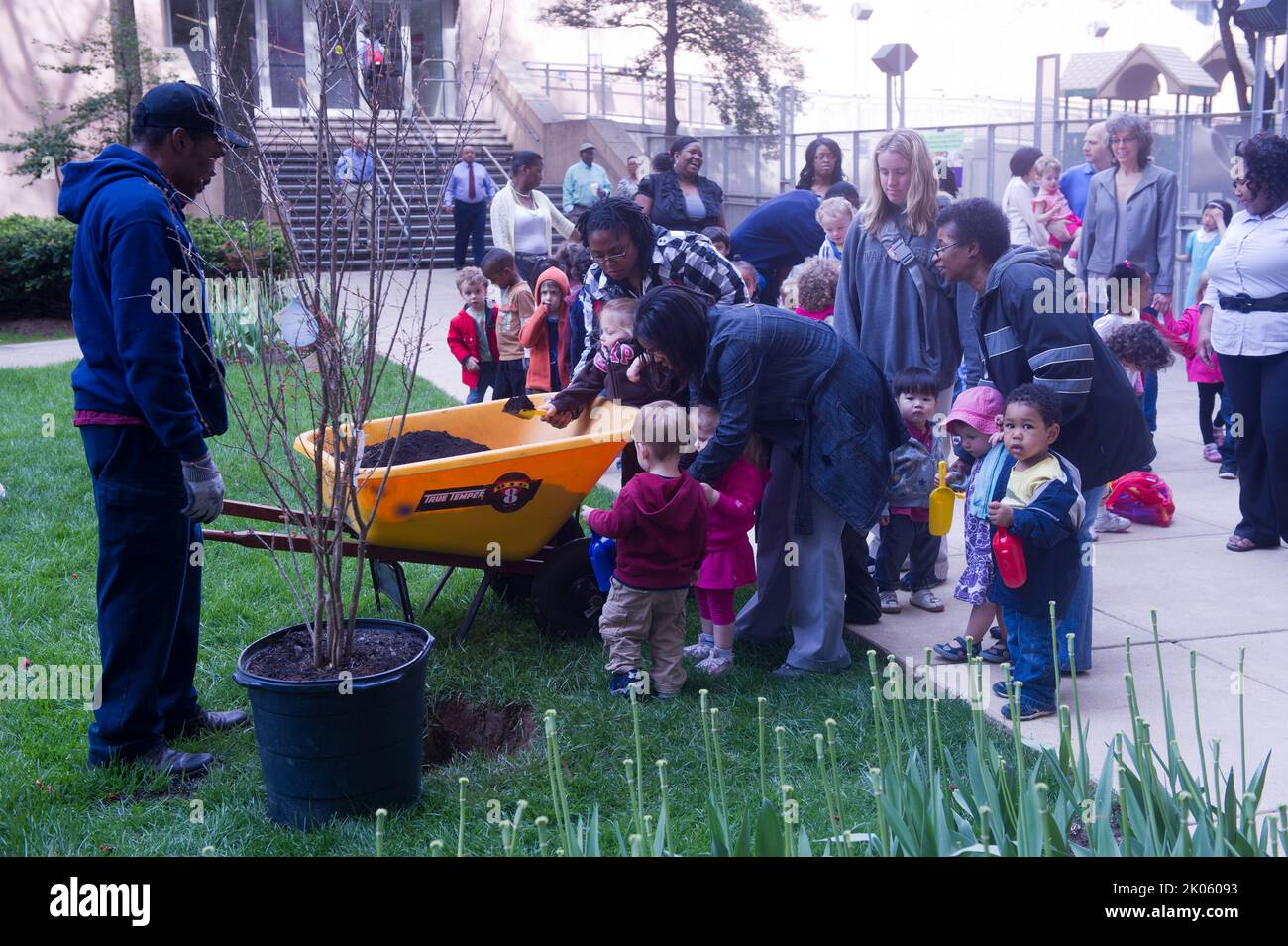 Earth Day tree planting event, with children outside HUD headquarters ...
