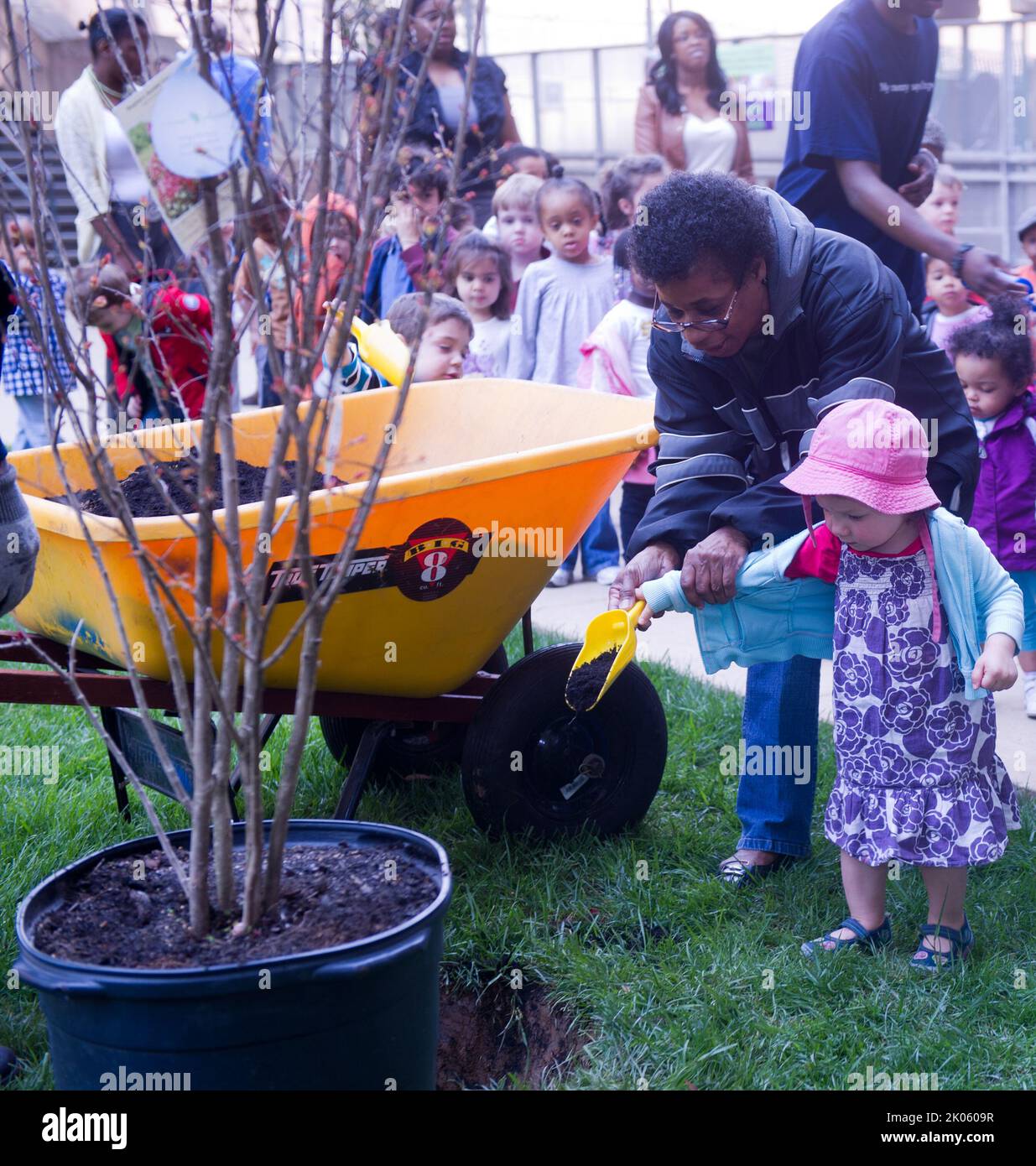 Earth Day tree planting event, with children outside HUD headquarters ...