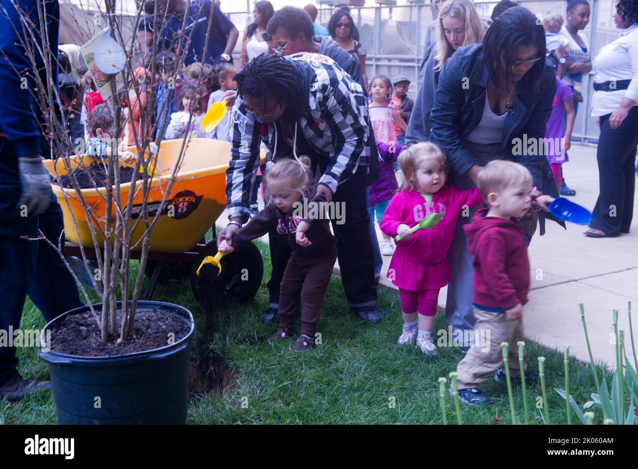 Earth Day tree planting event, with children outside HUD headquarters ...
