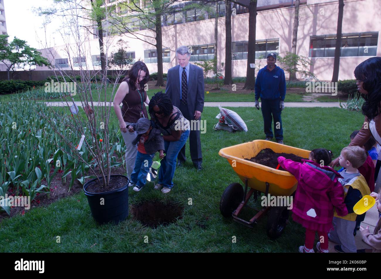 Earth Day tree planting event, with children outside HUD headquarters ...