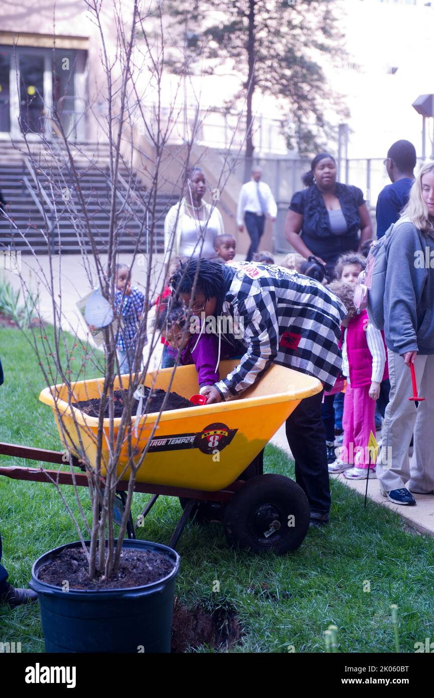 Earth Day tree planting event, with children outside HUD headquarters ...