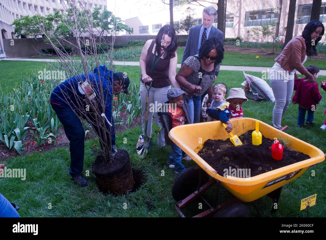 Earth Day tree planting event, with children outside HUD headquarters ...