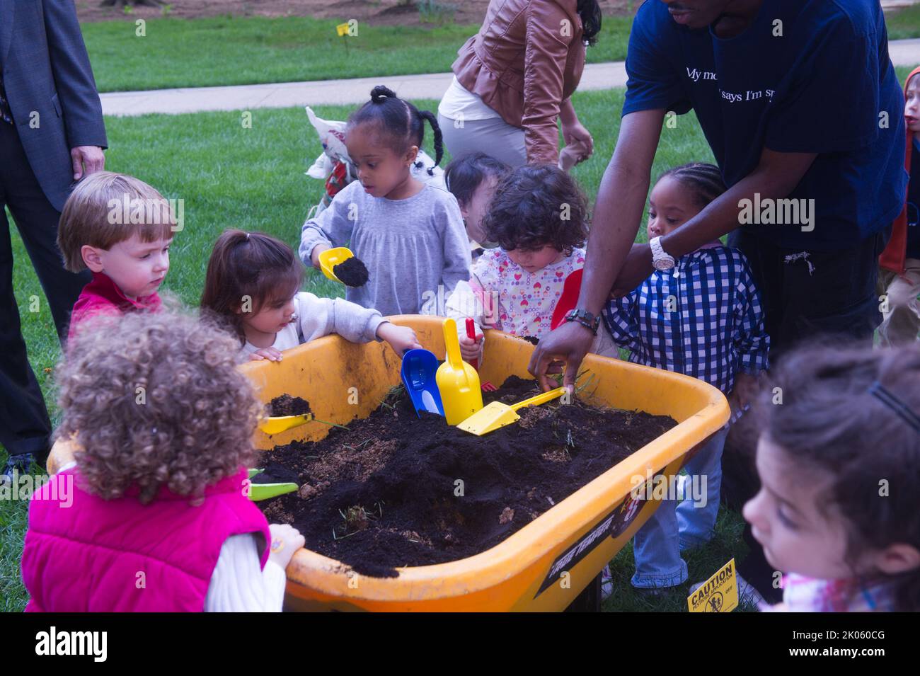 Earth Day tree planting event, with children outside HUD headquarters ...