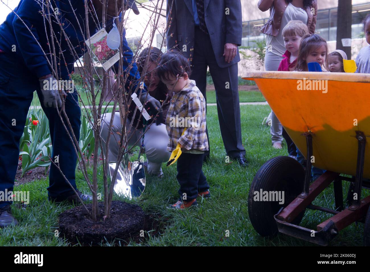 Earth Day tree planting event, with children outside HUD headquarters ...