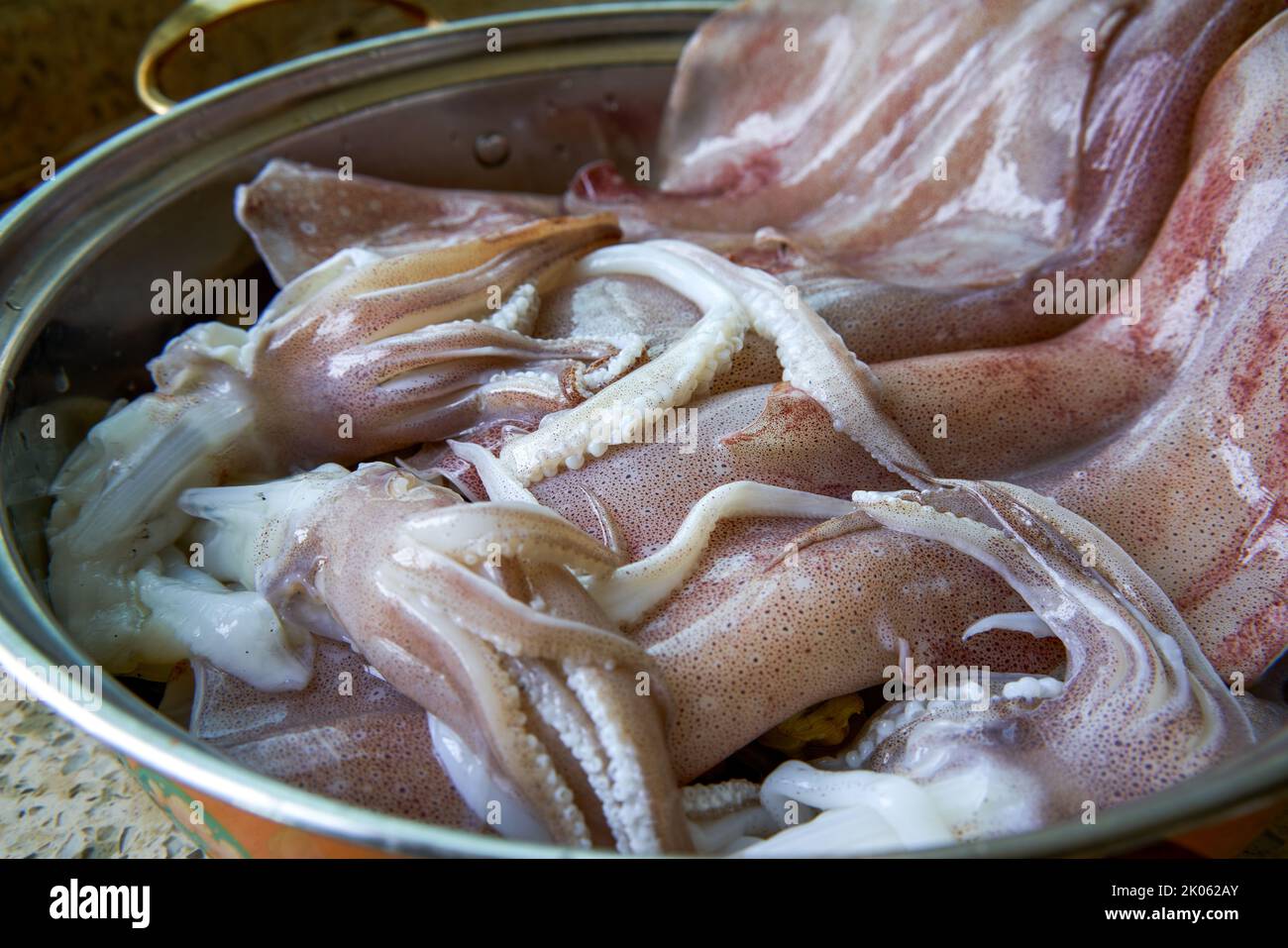 Fresh and plump seafood squid Stock Photo - Alamy