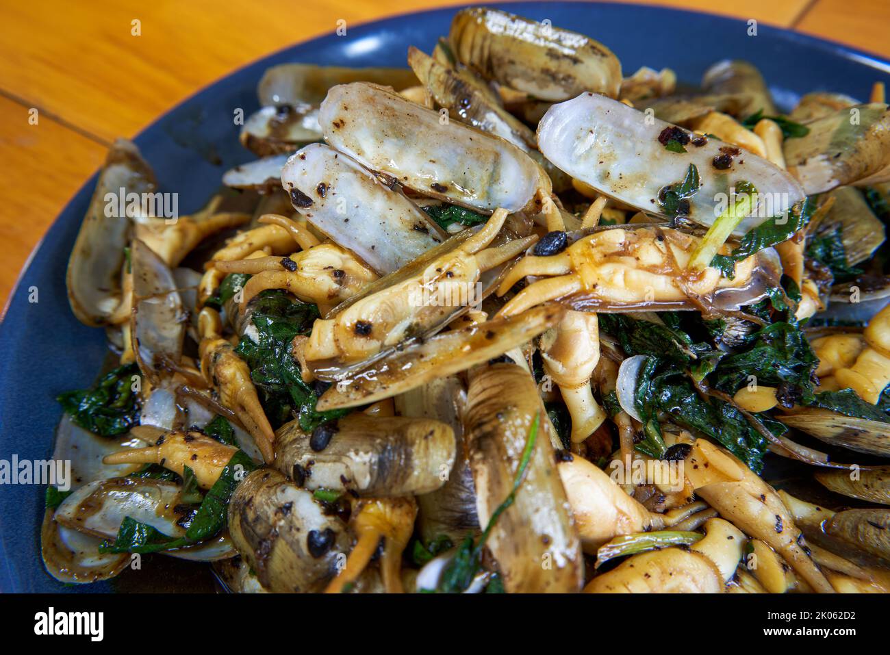 Chinese stir fry clams hi-res stock photography and images - Alamy