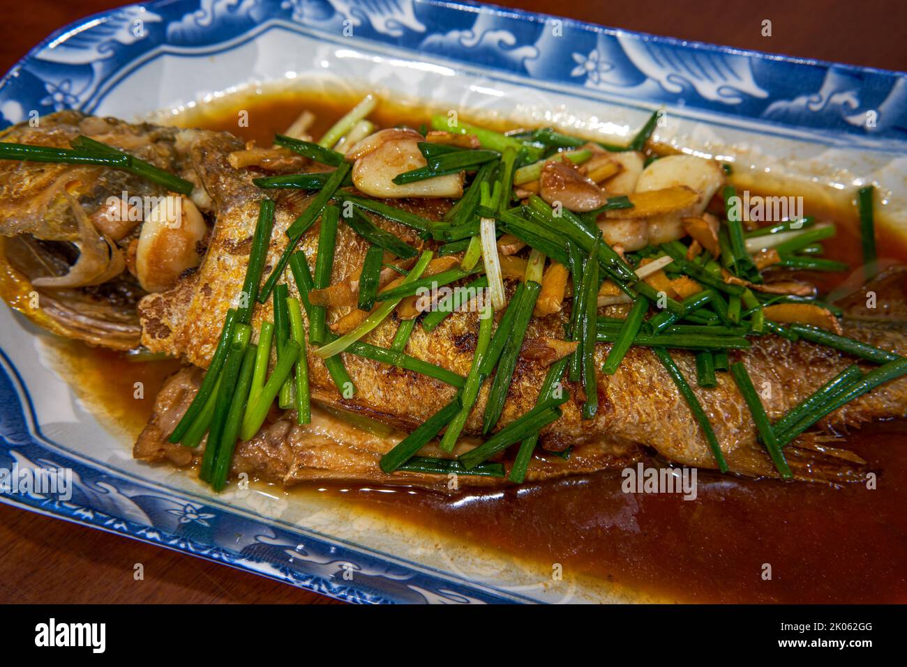 A delicious and sweet Chinese dish, braised large yellow croaker Stock ...
