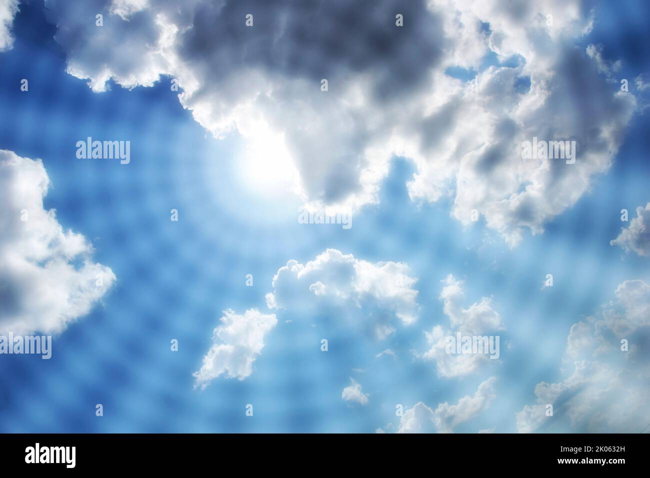 sun rays from clouds blue sky radial rays Stock Photo - Alamy