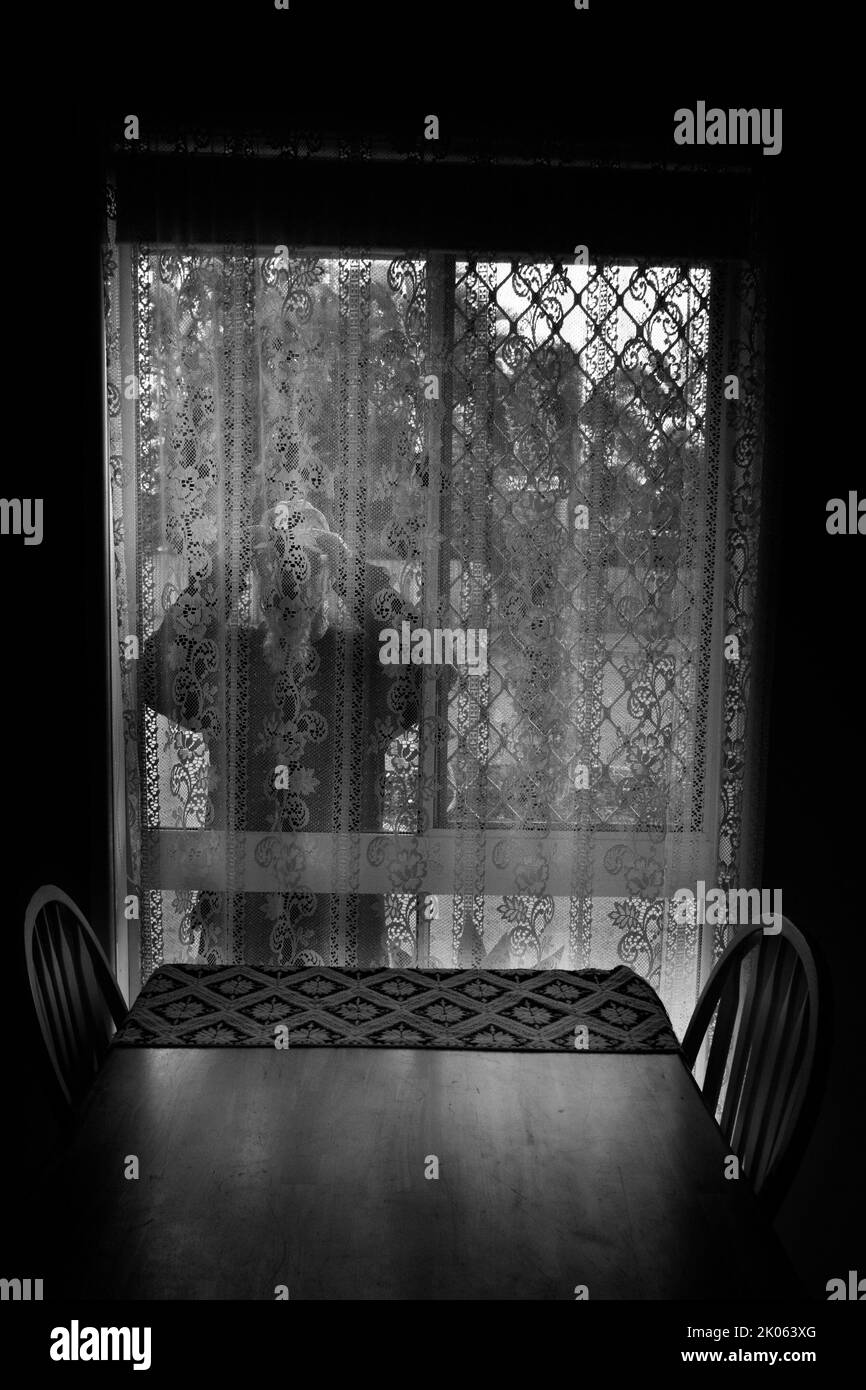 Man looking home Black and White Stock Photos & Images - Alamy