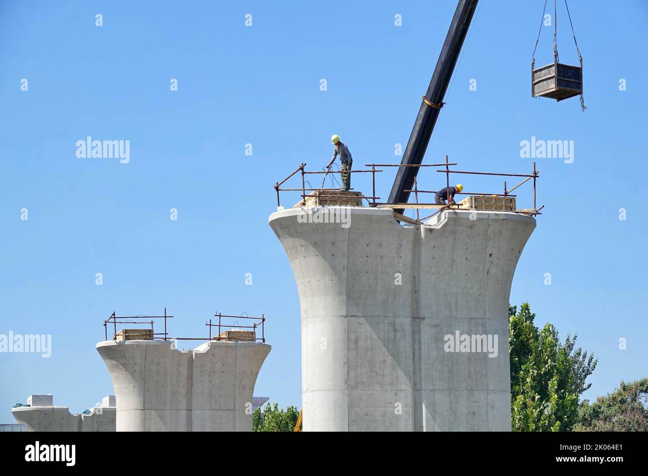 YANTAI, CHINA - SEPTEMBER 10, 2022 - Construction workers pour stones ...