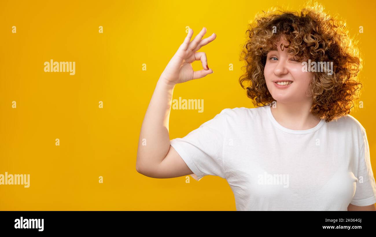 okay sign body positive overweight plus size woman Stock Photo - Alamy
