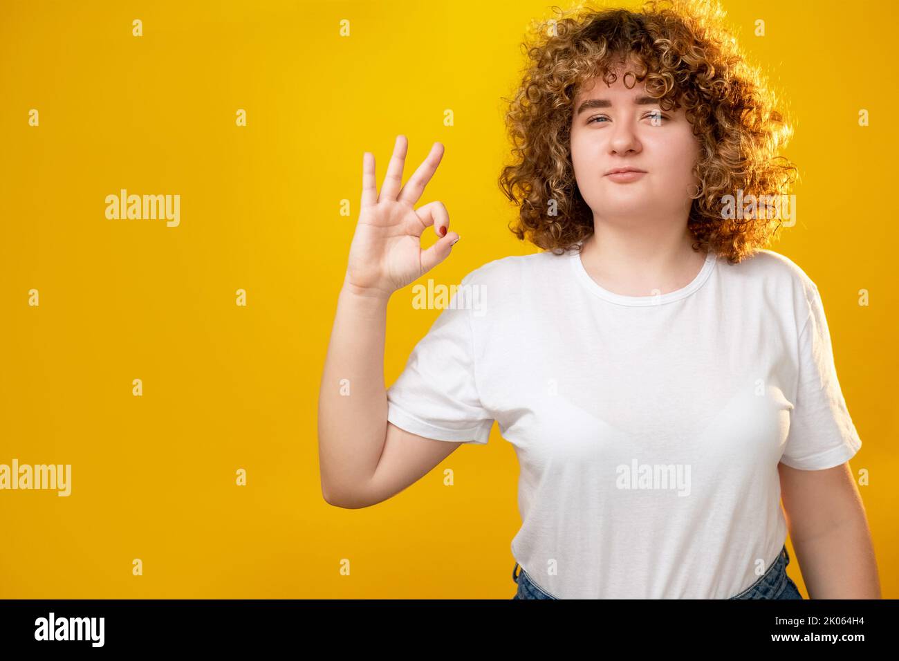 ok gesture body positive overweight healthy woman Stock Photo - Alamy