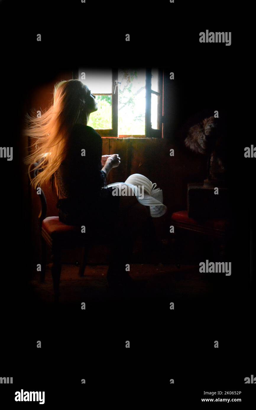 Lady in old cabin hi-res stock photography and images - Alamy