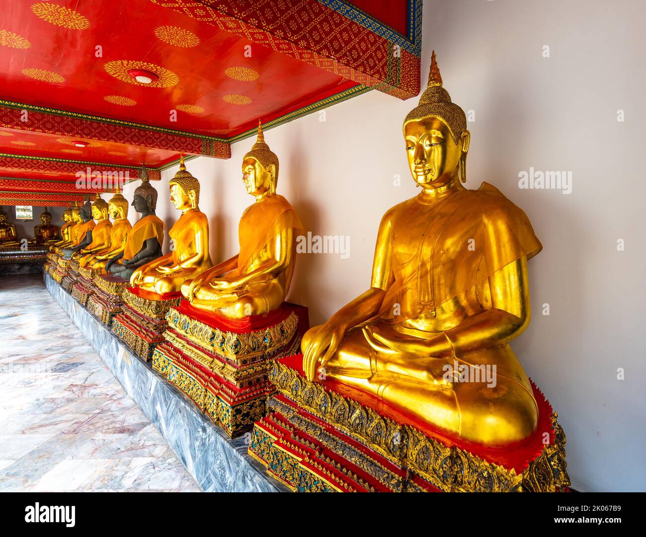 Statues of Buddha in Wat Pho temple, Bangkok Thailand. Golden statues ...