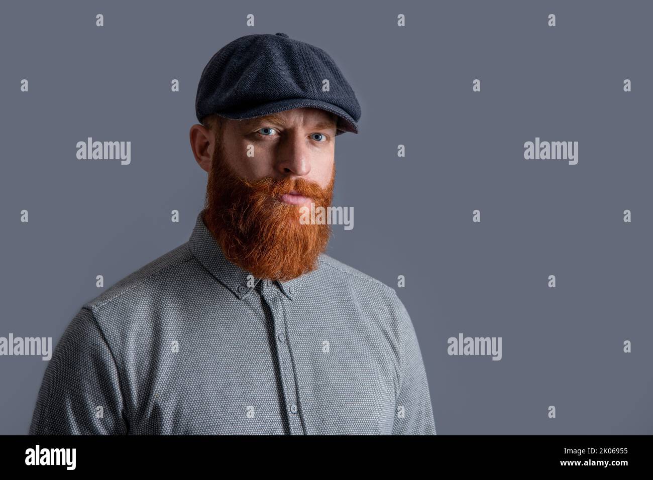 Portrait of handsome Irish man. Bearded man with serious face. Unshaven ...