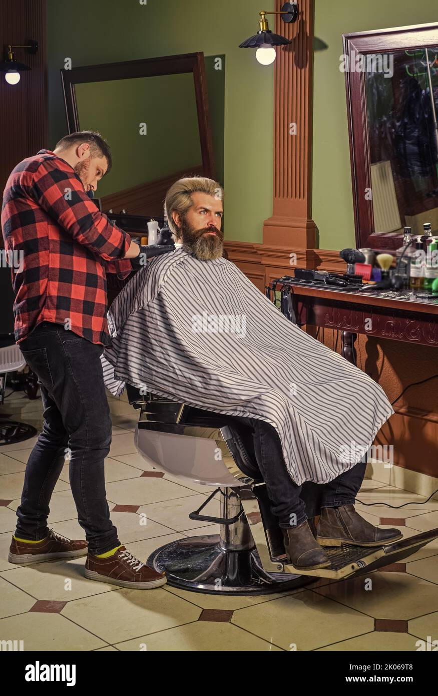Professional barber and client. Hipster man want new hairstyle ...