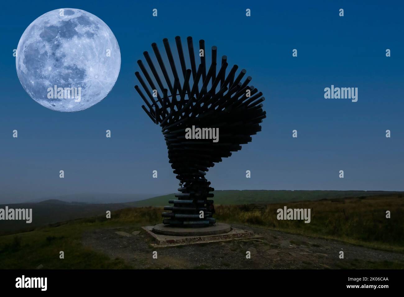 A full moon over the Ringing Singing Tree nearly Burnley in Lancashire ...