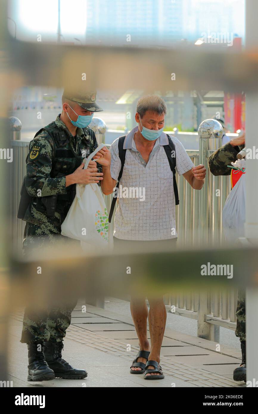 GUIGANG, CHINA - SEPTEMBER 9, 2022 - Armed police officers help ...