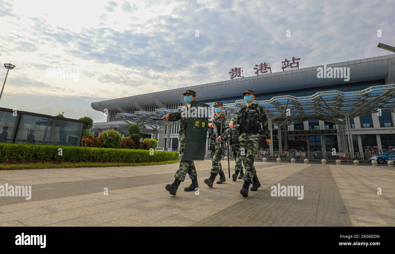 GUIGANG, CHINA - SEPTEMBER 9, 2022 - Armed police officers patrol at a ...