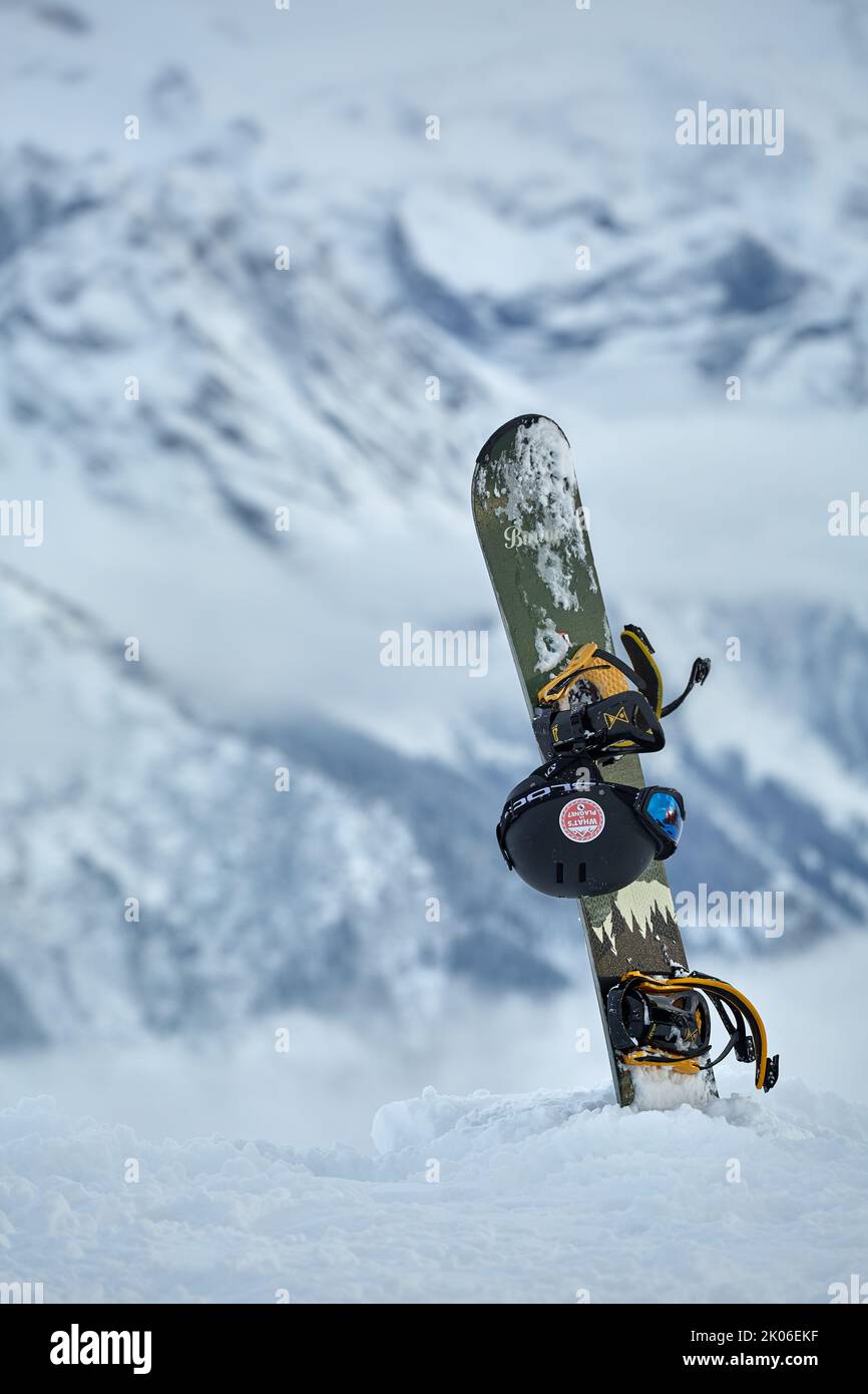 Snowboard on a mountain top Stock Photo - Alamy