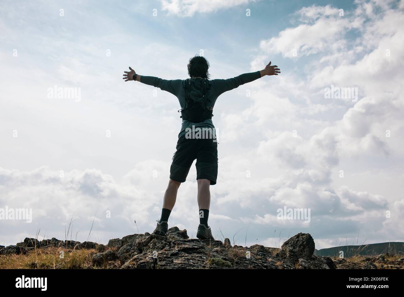 Rear view of Chinese male trail runner Stock Photo - Alamy