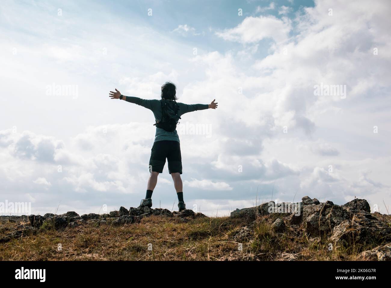 Rear view of Chinese male trail runner Stock Photo - Alamy