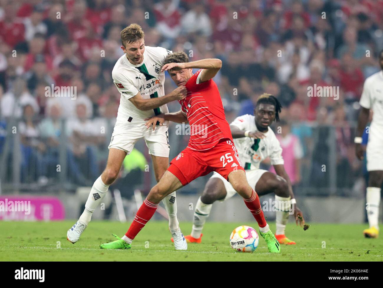 Thomas Mueller of Bayern Muenchen Christoph Kramer of Borussia ...