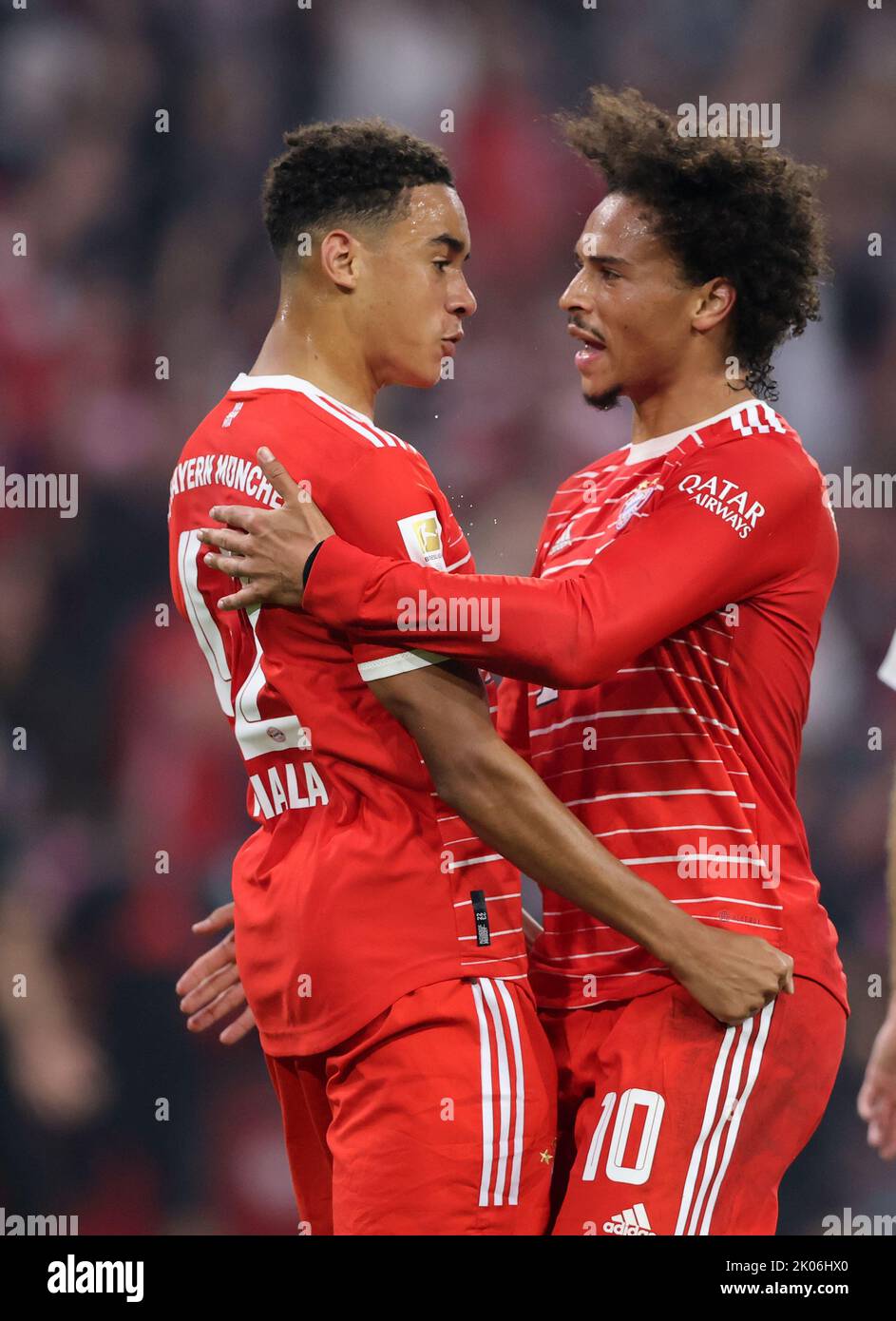 Jamal Musiala of Bayern Muenchen mit Leroy Sane of Bayern Muenchen nach ...