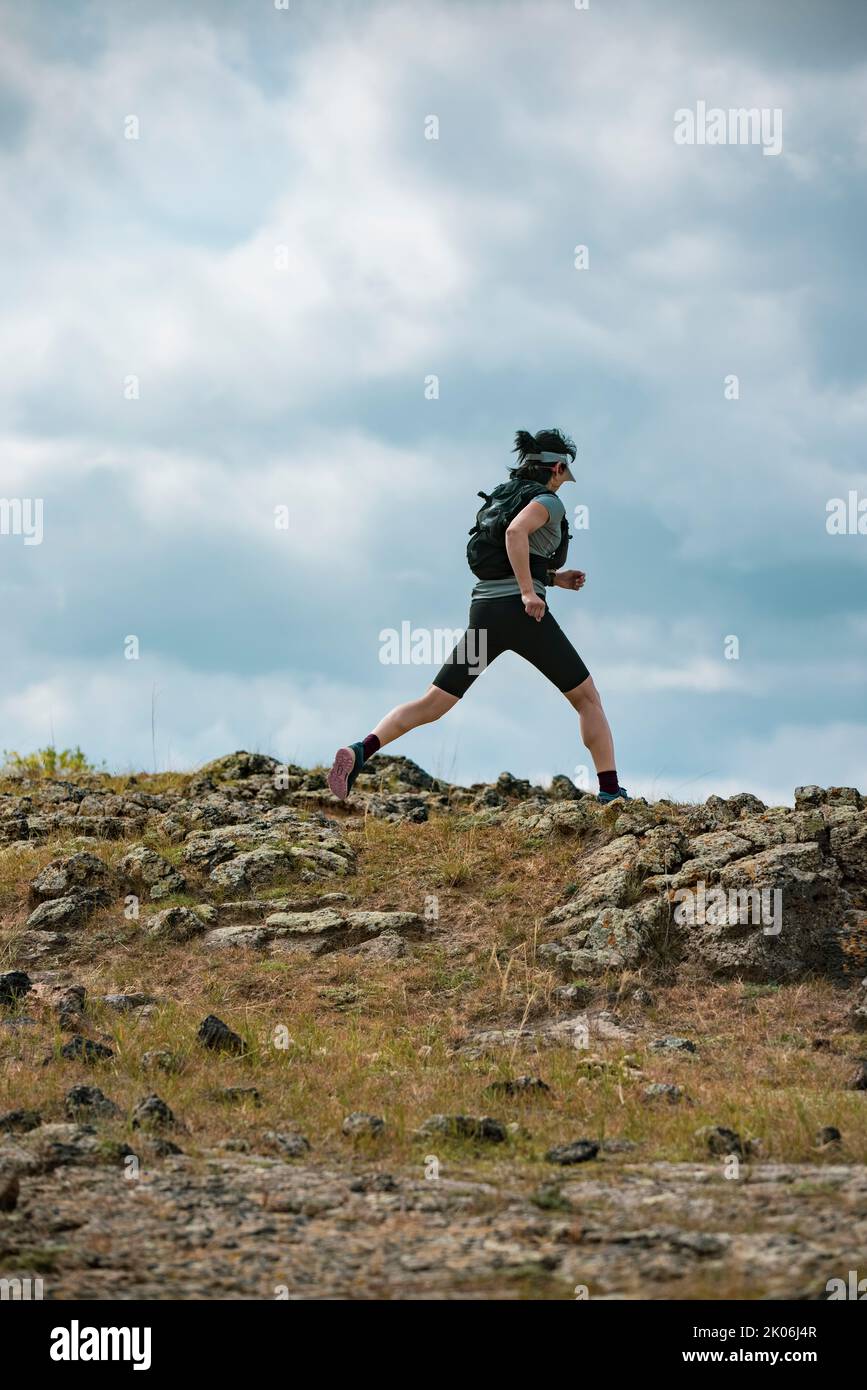 Chinese female trail runner training in nature Stock Photo - Alamy