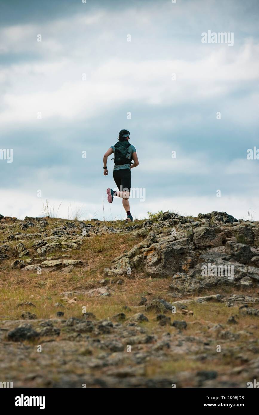 Chinese female trail runner training in nature Stock Photo - Alamy