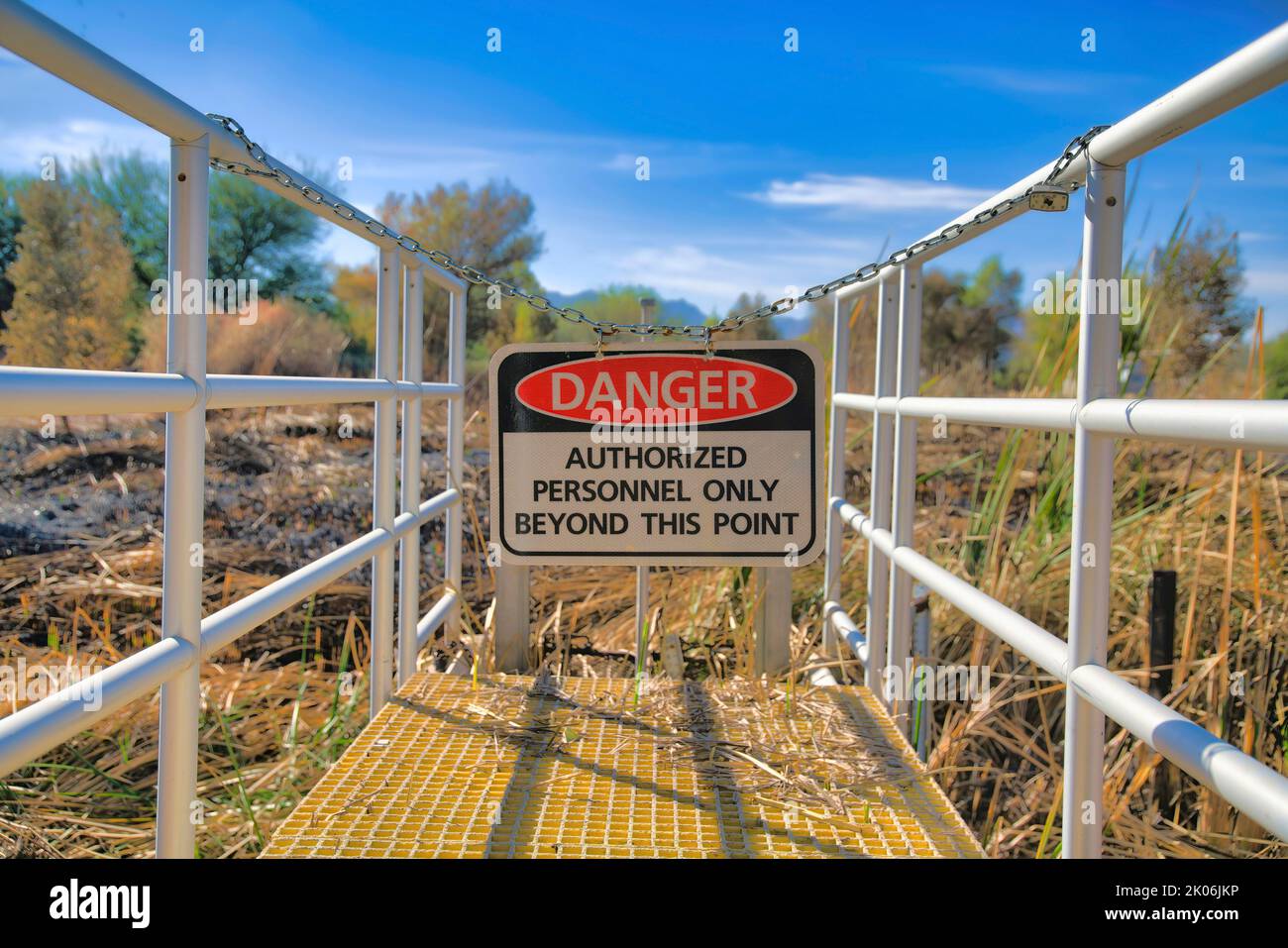 Danger sign at a boardwalk in Sweetwater Wetlands park in Tucson ...