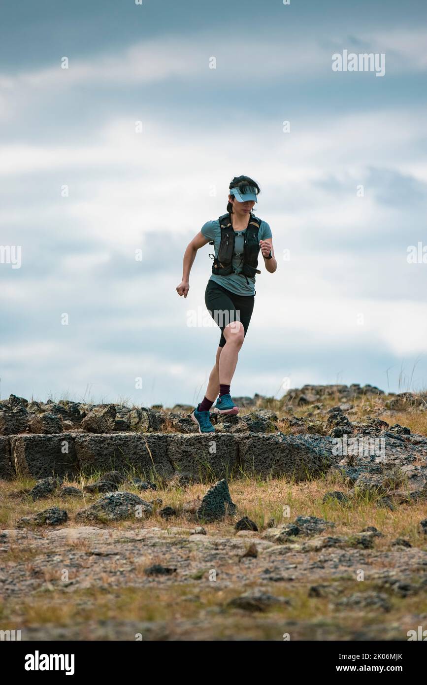 Chinese female trail runner training in nature Stock Photo - Alamy