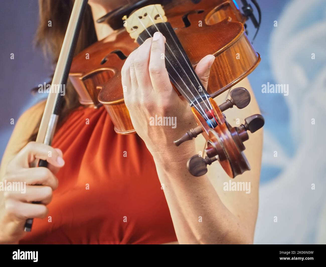 Woman with a concert violin Stock Photo - Alamy