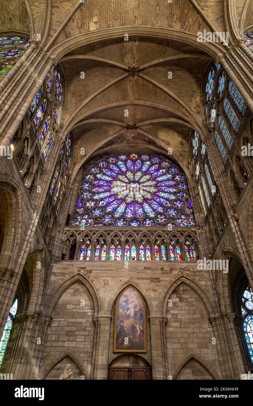 Rayonnant rose window in the Basilica of Saint-Denis, a cathedral of ...