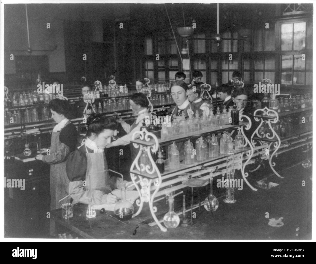 Students in a chemistry class conducting an experiment, Western High ...