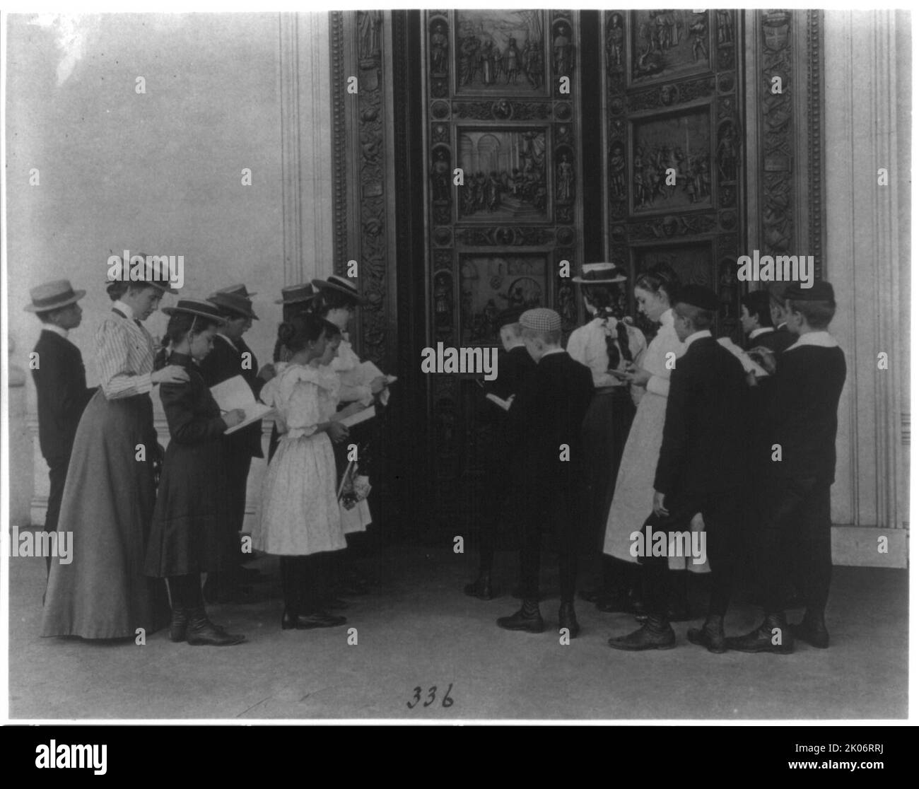 Washington, D.C. school children on field trip - examining the bronze ...