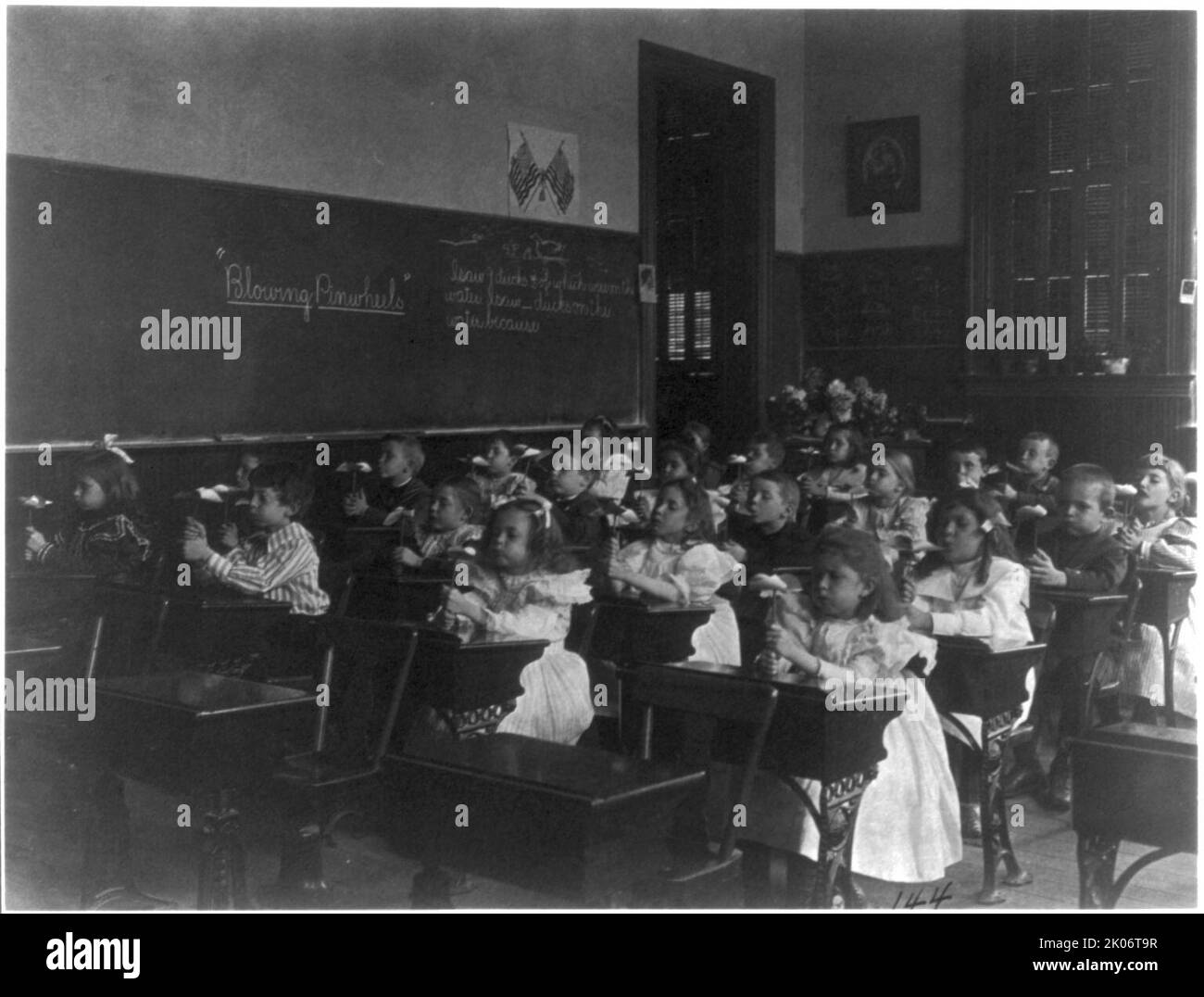 Children in a classroom blowing pinwheels in a Washington, D.C., grade ...