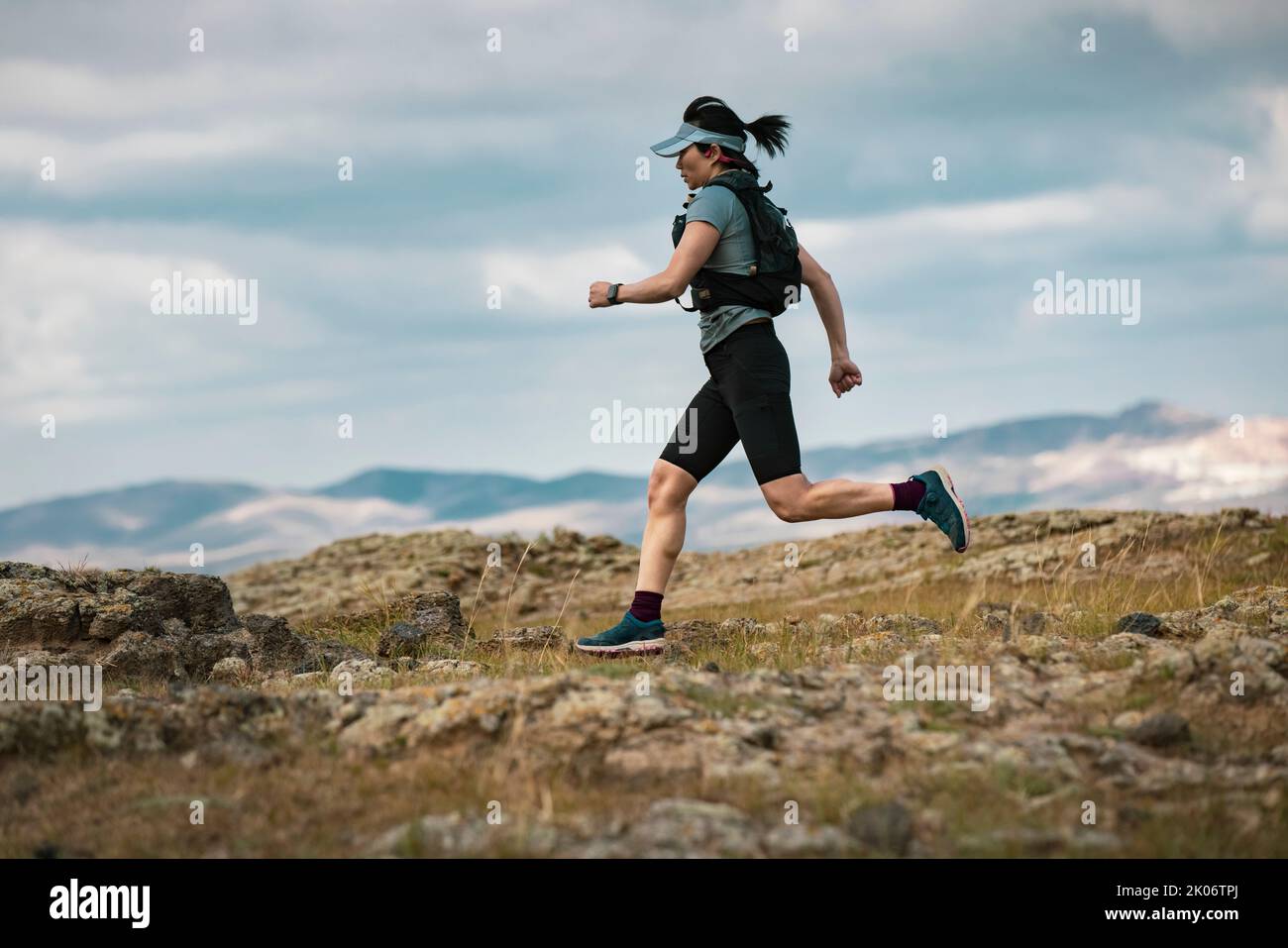Chinese female trail runner training in nature Stock Photo - Alamy