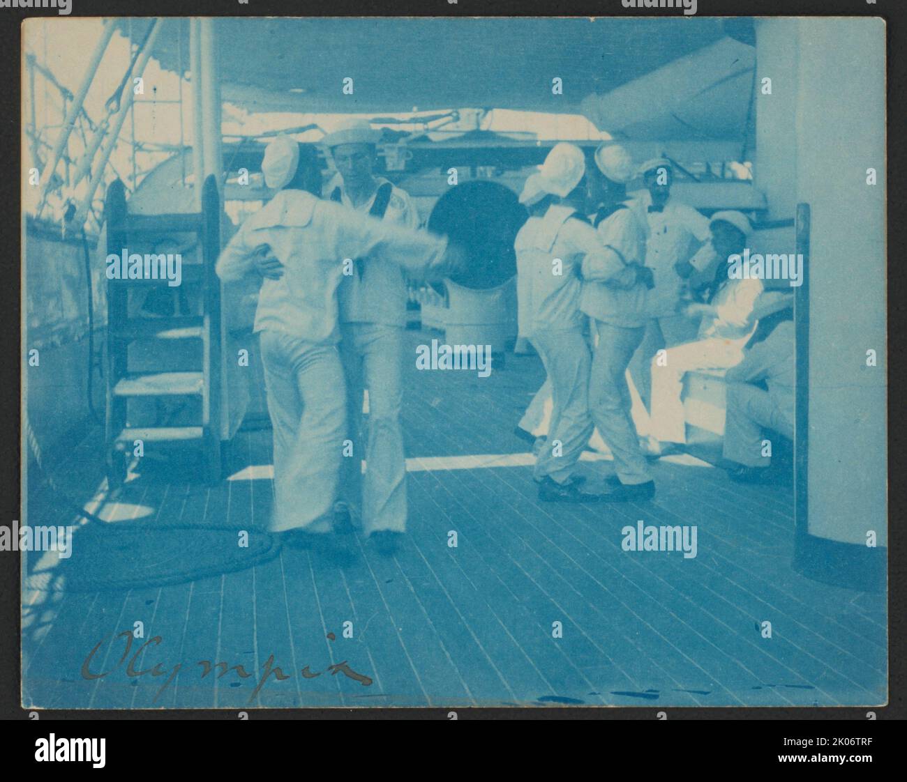 OLYMPIA, 1899. Photograph shows sailors aboard the [U.S.S.] OLYMPIA ...