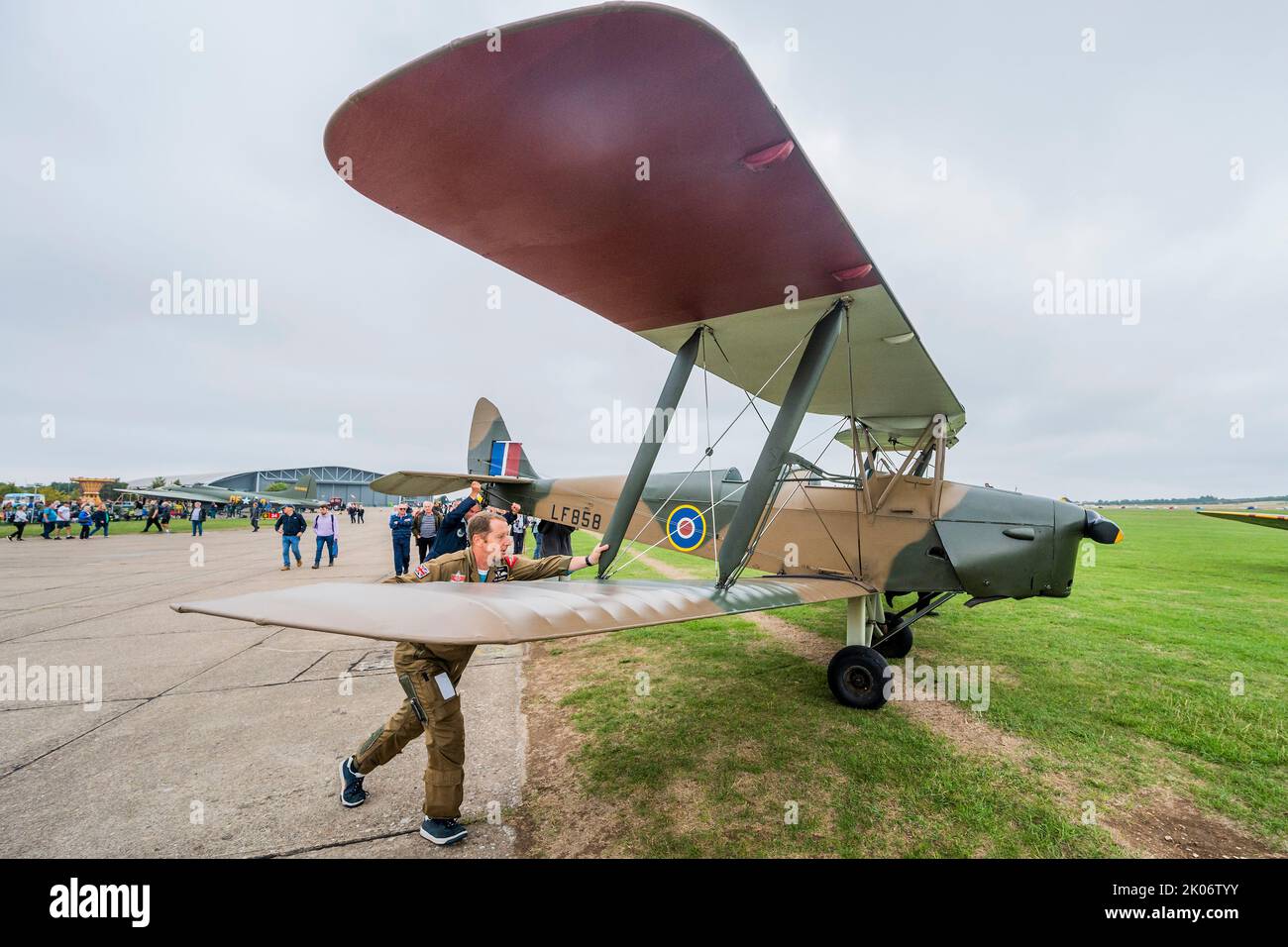London, UK. 10th Sep, 2022. A bi-plane from before WWII is pushed on to ...
