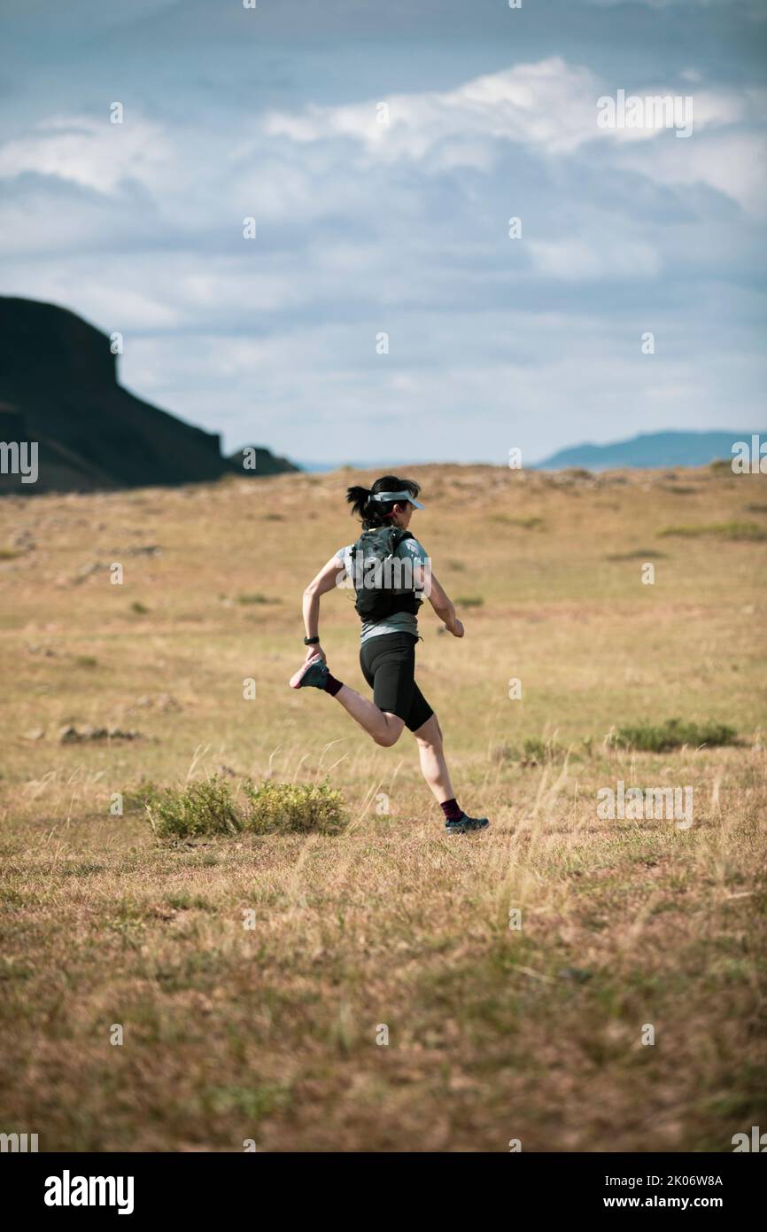 Chinese female trail runner training in nature Stock Photo - Alamy