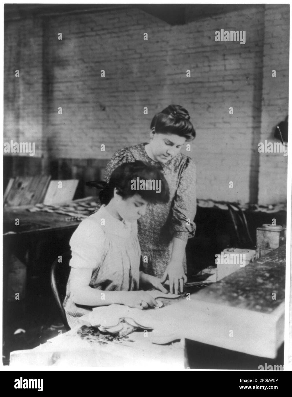 Miss Bessie Prince and Miss Ella Parrott working in a shoe factory ...
