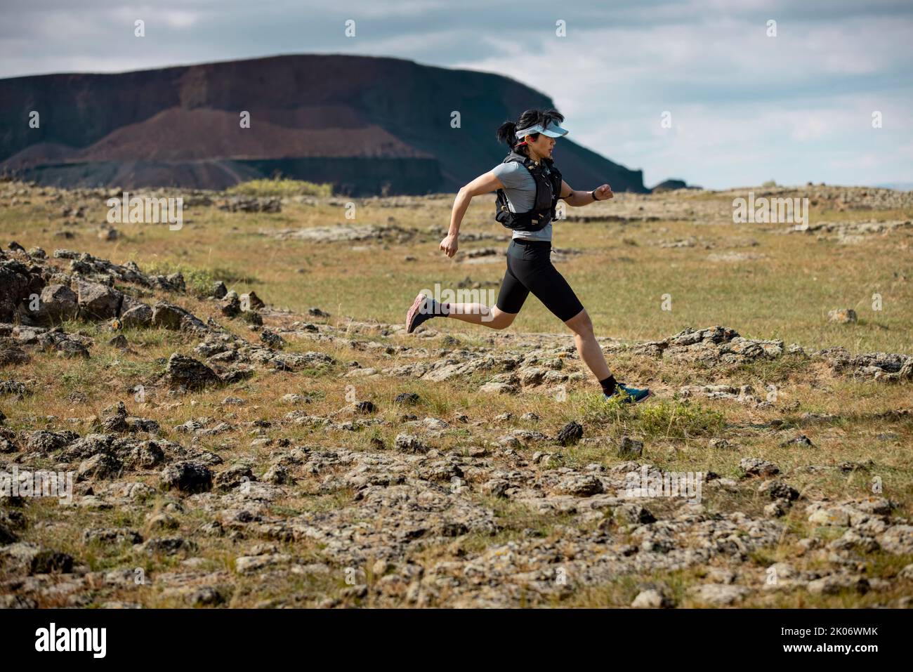 Chinese female trail runner training in nature Stock Photo - Alamy