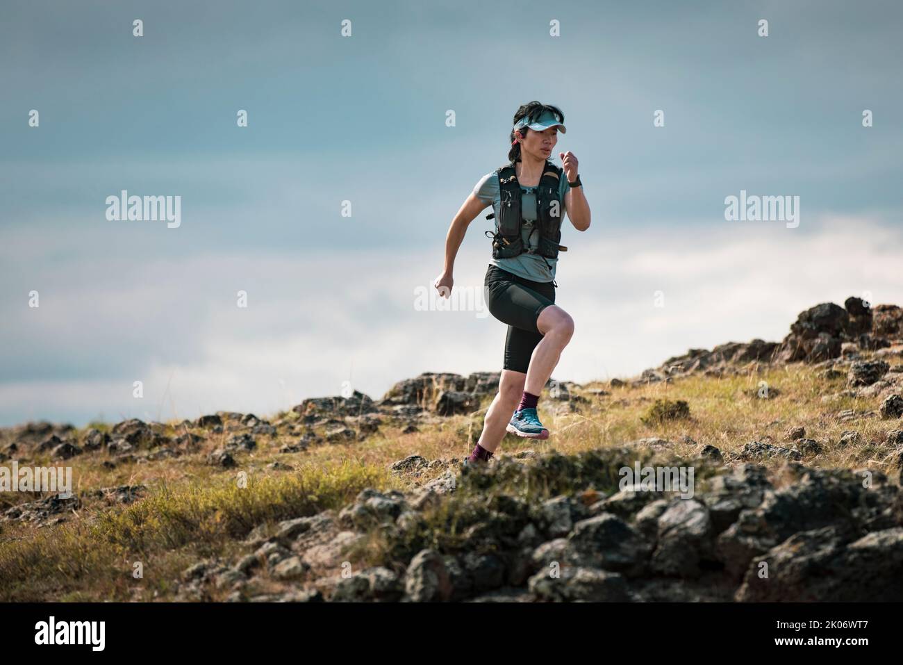 Chinese female trail runner training in nature Stock Photo - Alamy