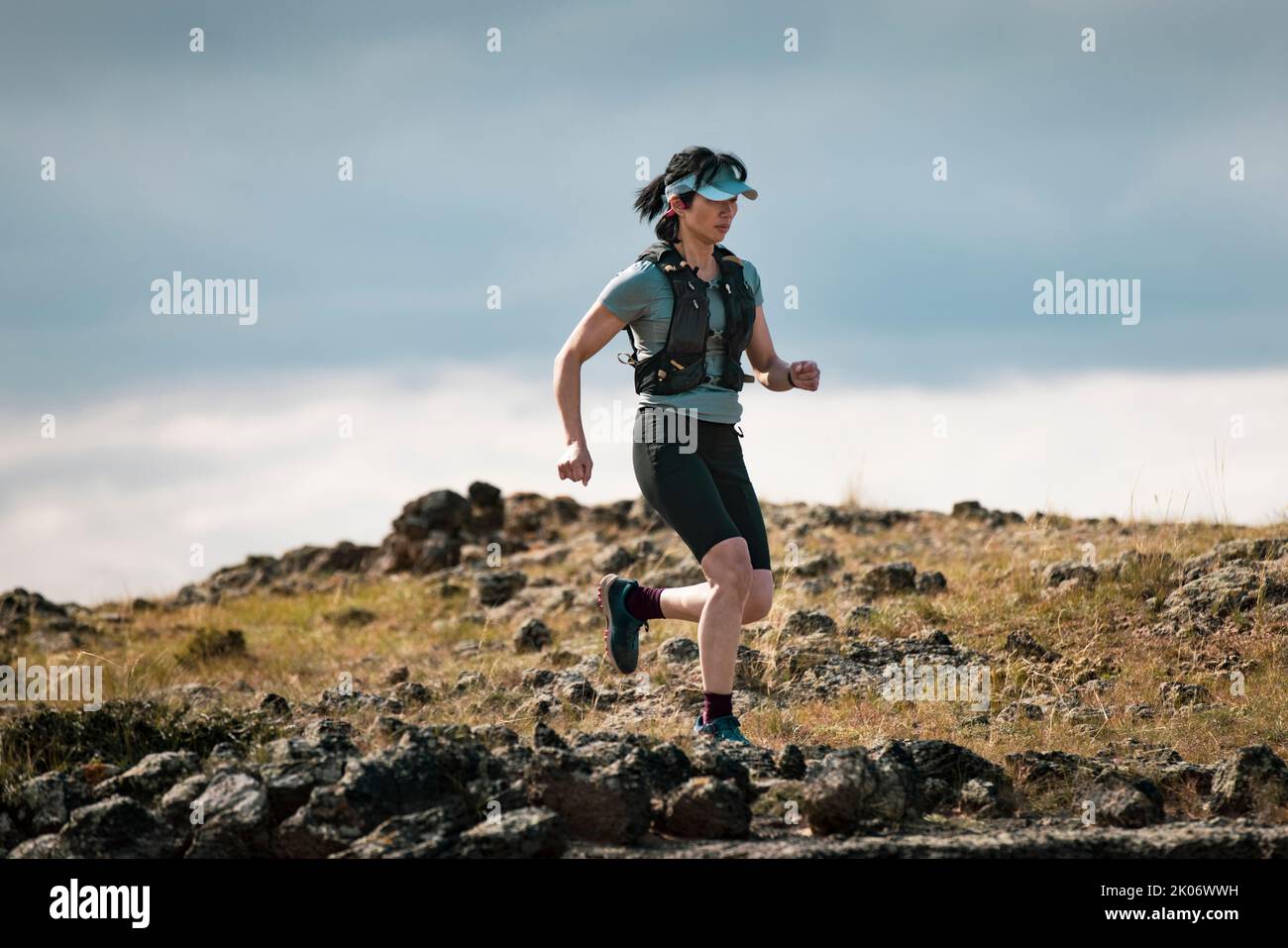 Chinese female trail runner training in nature Stock Photo - Alamy
